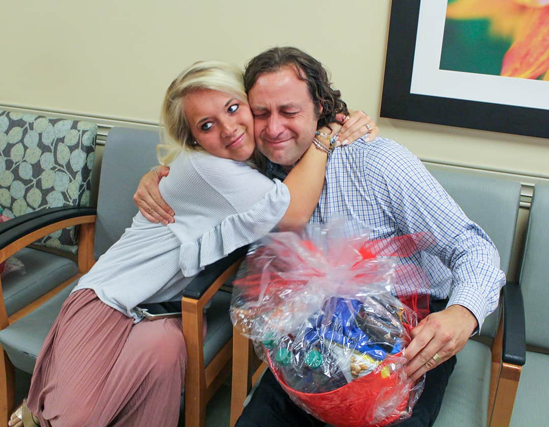 Haley and Dr. Jones Hug - Regional One Health